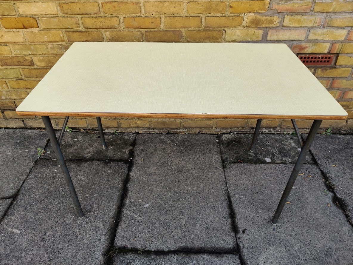 Table – Yellow formica with metal legs (1965) – Revival Props